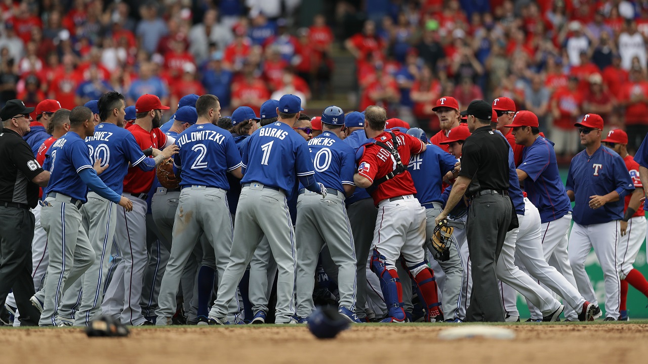Rangers player punches Jose Bautista in the face during huge bench ...